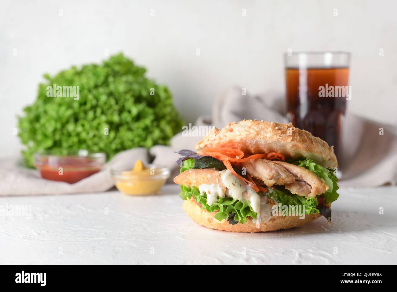 Fresh doner kebab in bun on white background Stock Photo - Alamy