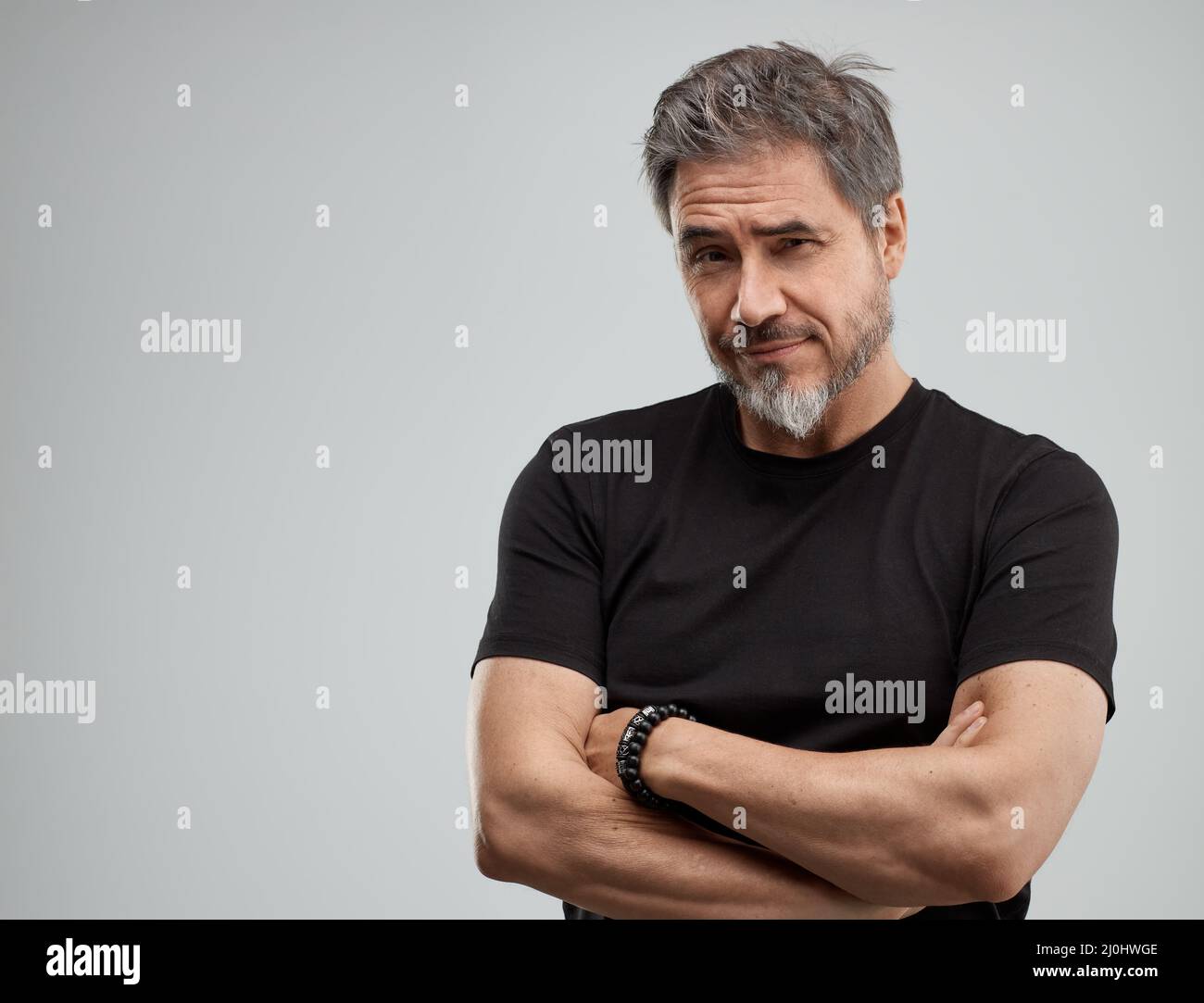 Portrait of happy older white man, beard gray hair, smiling. Gray ...