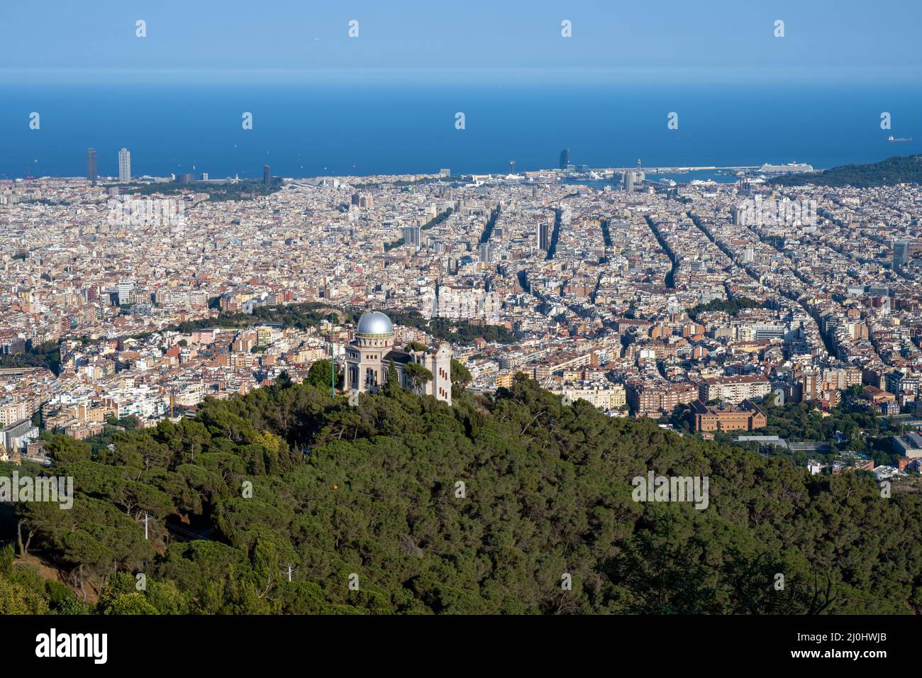 View over downtown Barcelona with the Fabra Observatory in the ...