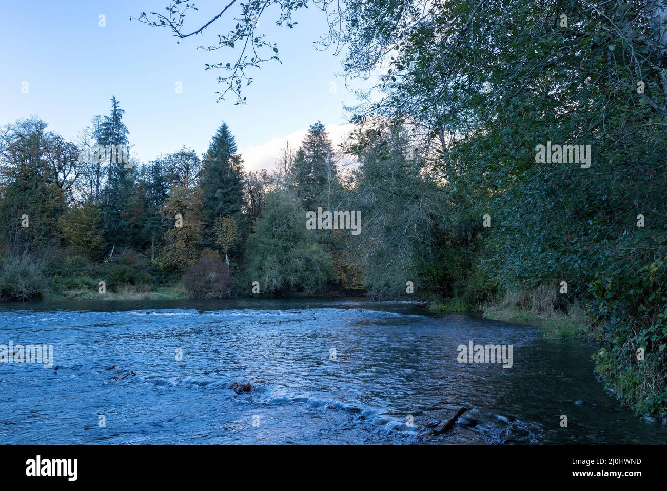 Peaceful river winding through rocky hi-res stock photography and ...