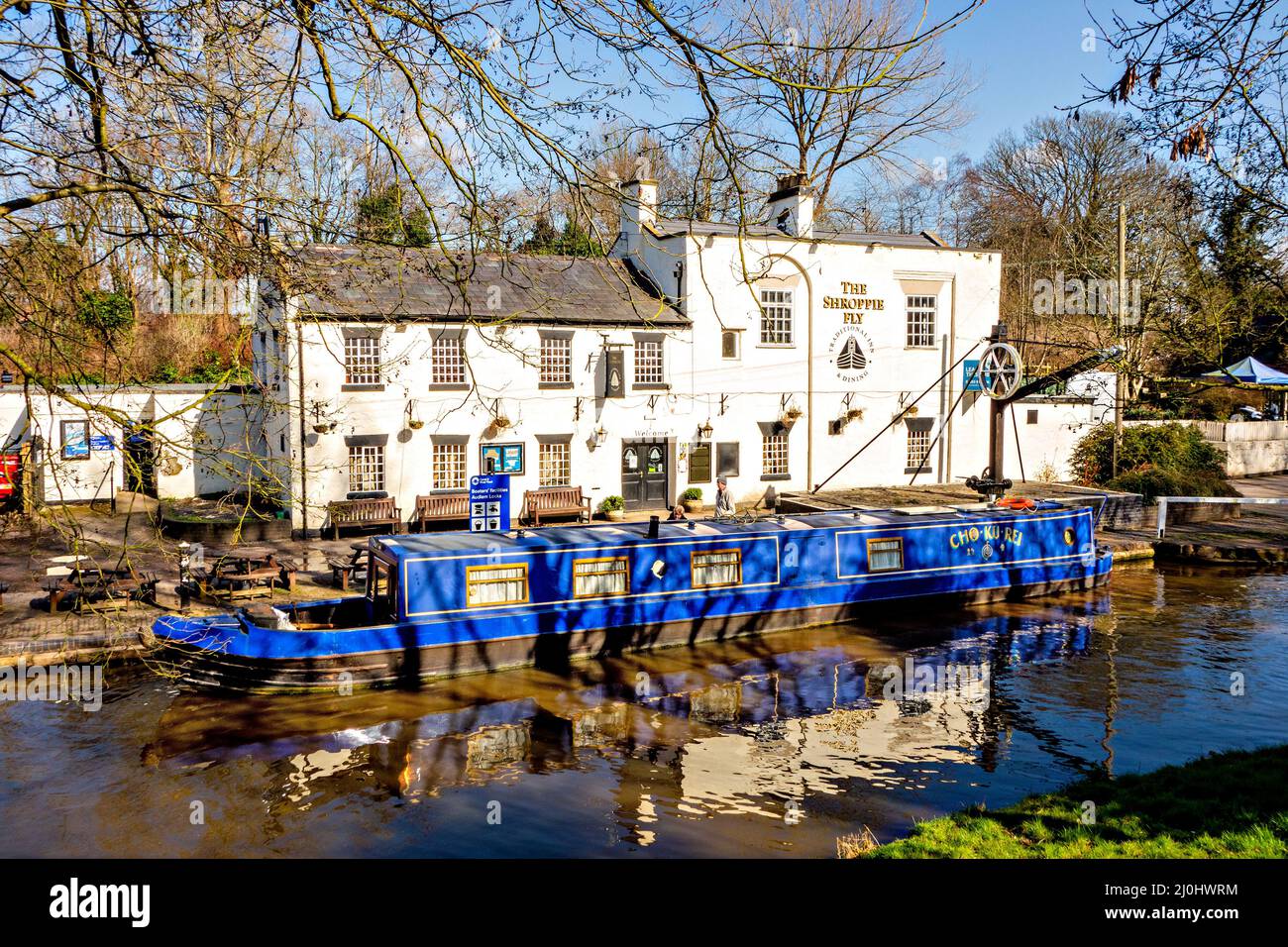 Canal narrowboat moored outside the Shroppie Fly pub on the Shropshire ...