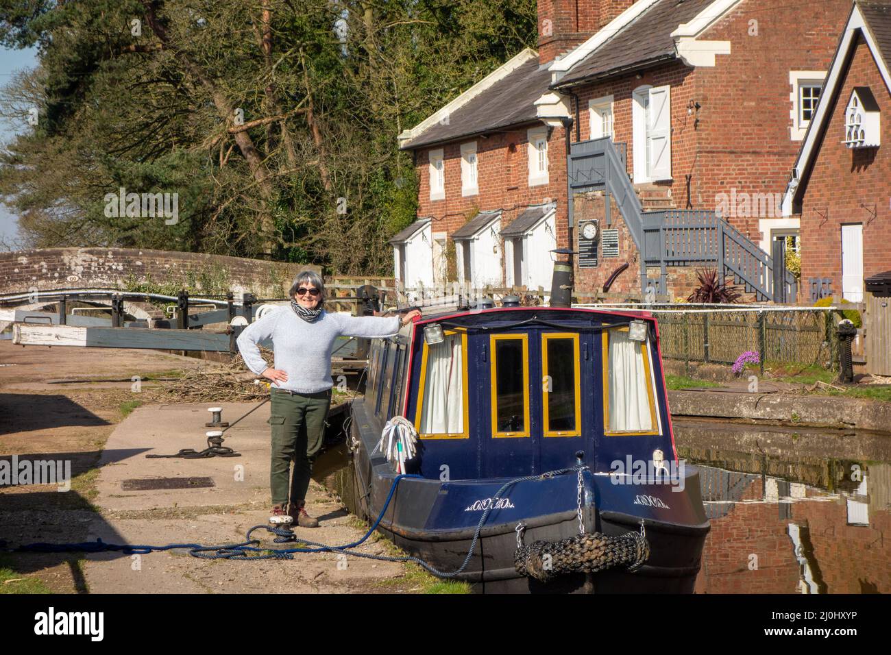 Canal narrowboat passing through Tyrley locks on the Shropshire union ...