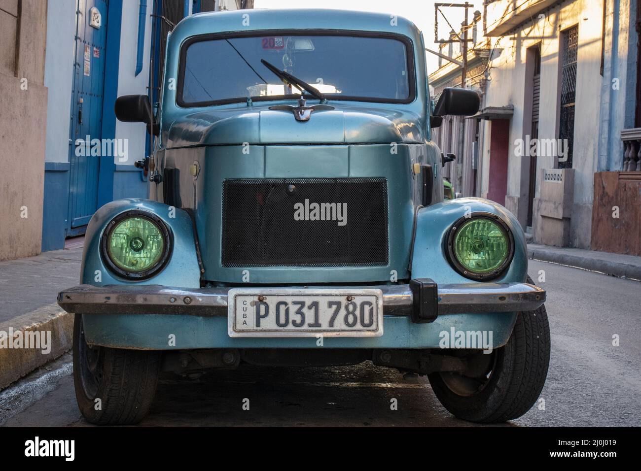 Commercial pale blue vehicle close-up front shot Stock Photo - Alamy