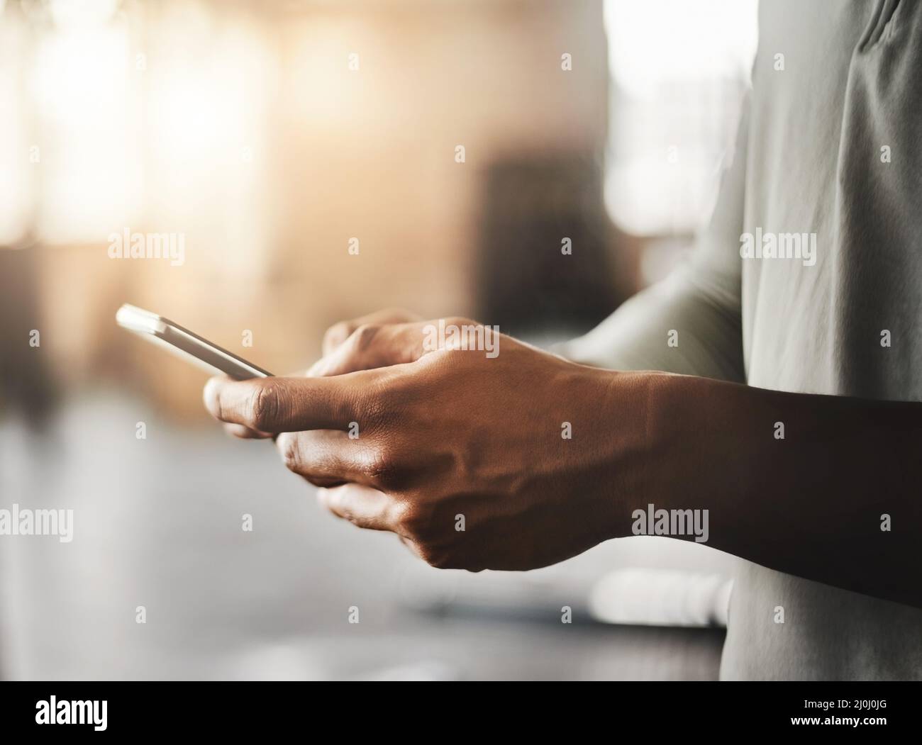 Using apps to get in and stay in shape. Shot of an unrecognizable man ...