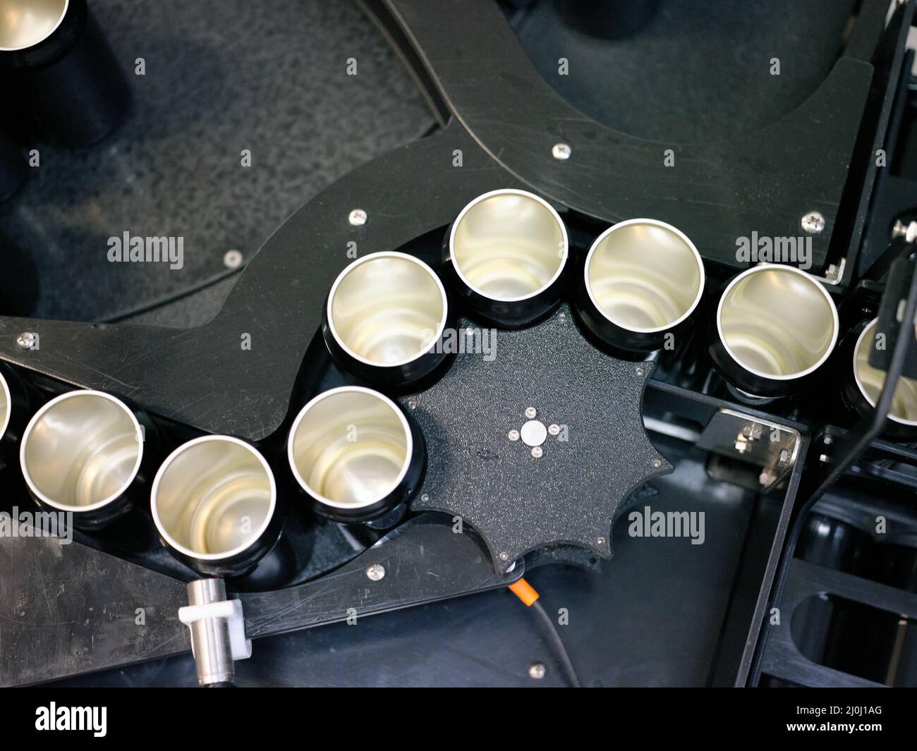 Production line for packaging beer from empty cans Stock Photo - Alamy