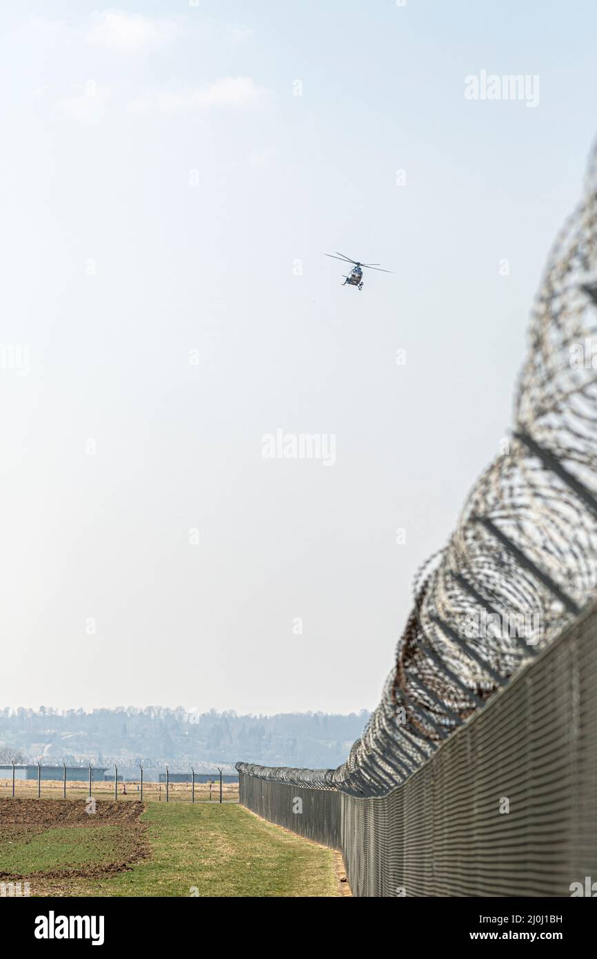 a barbed wire fence to protect a border Stock Photo - Alamy