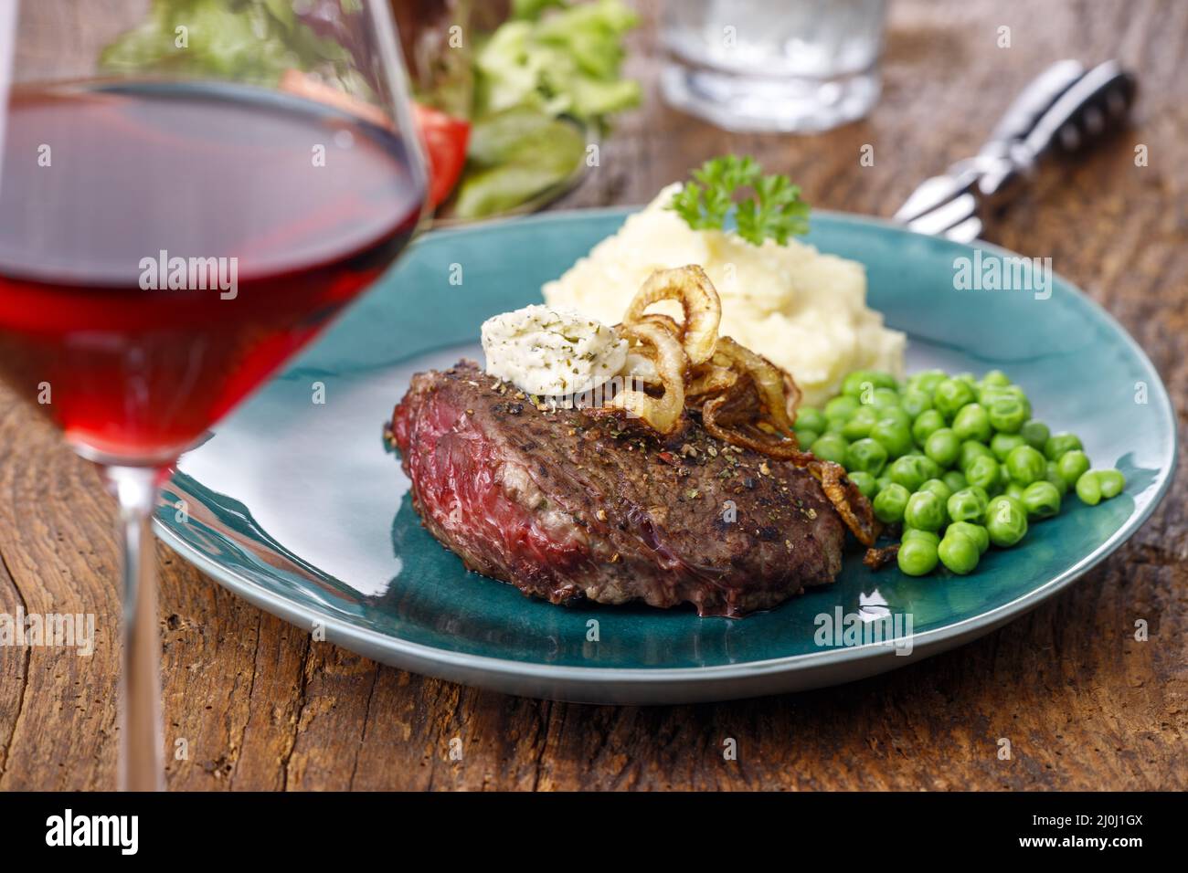 Grilled steak with fried onions Stock Photo - Alamy