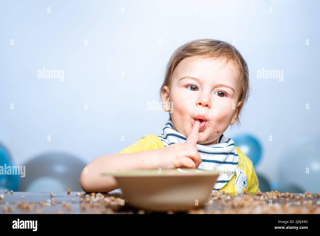 Babies eating, healthy food for a baby. Funny kid boy with plate and ...