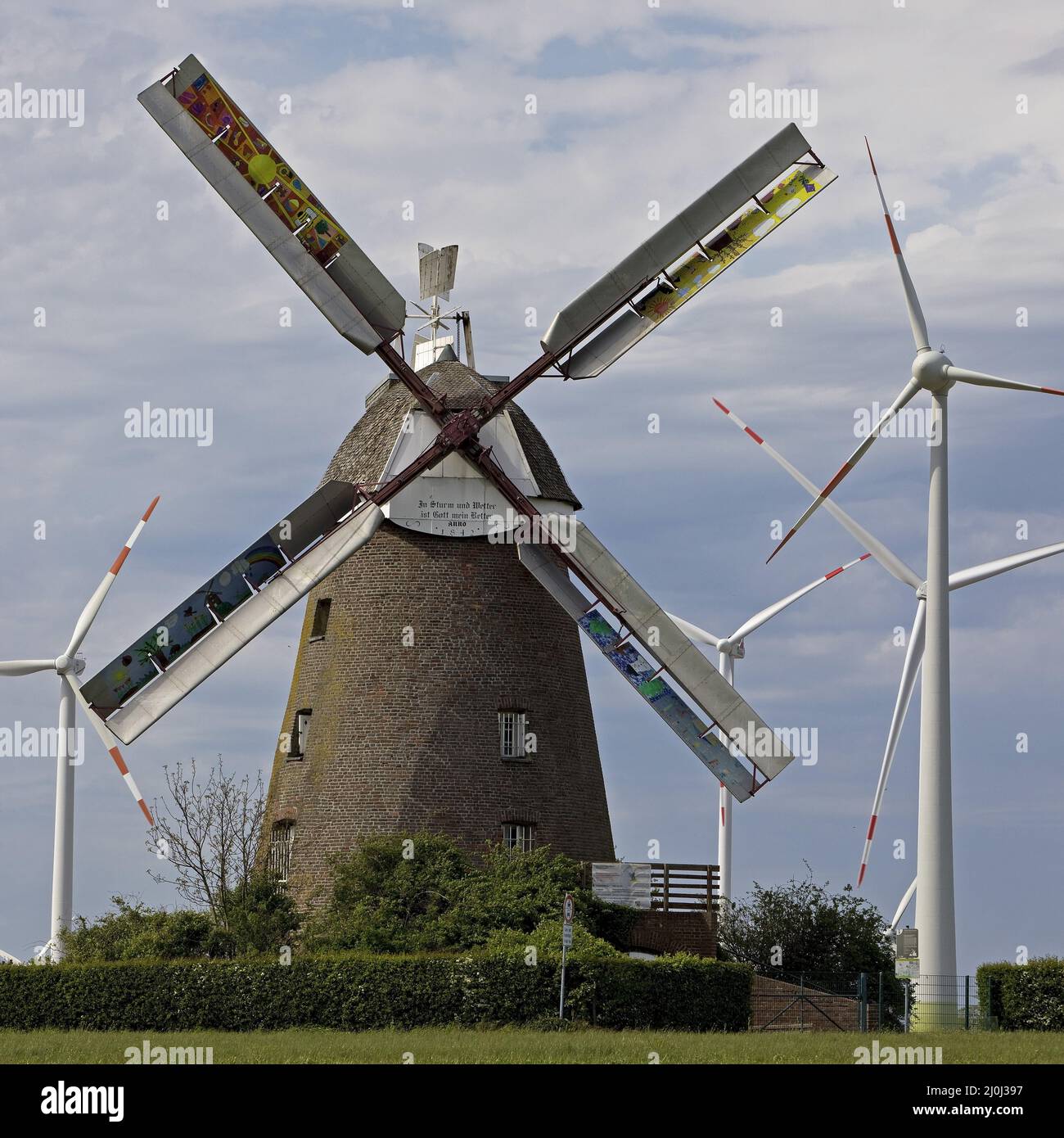 Museum windmill with wind turbines, wind energy use yesterday and today ...