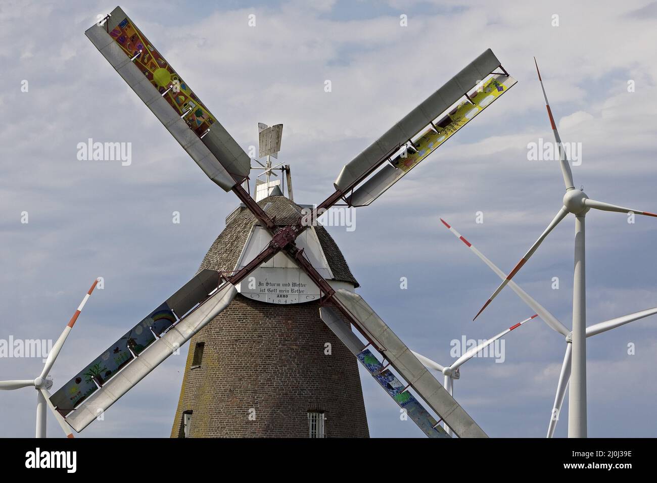 Museum windmill with wind turbines, wind energy use yesterday and today ...