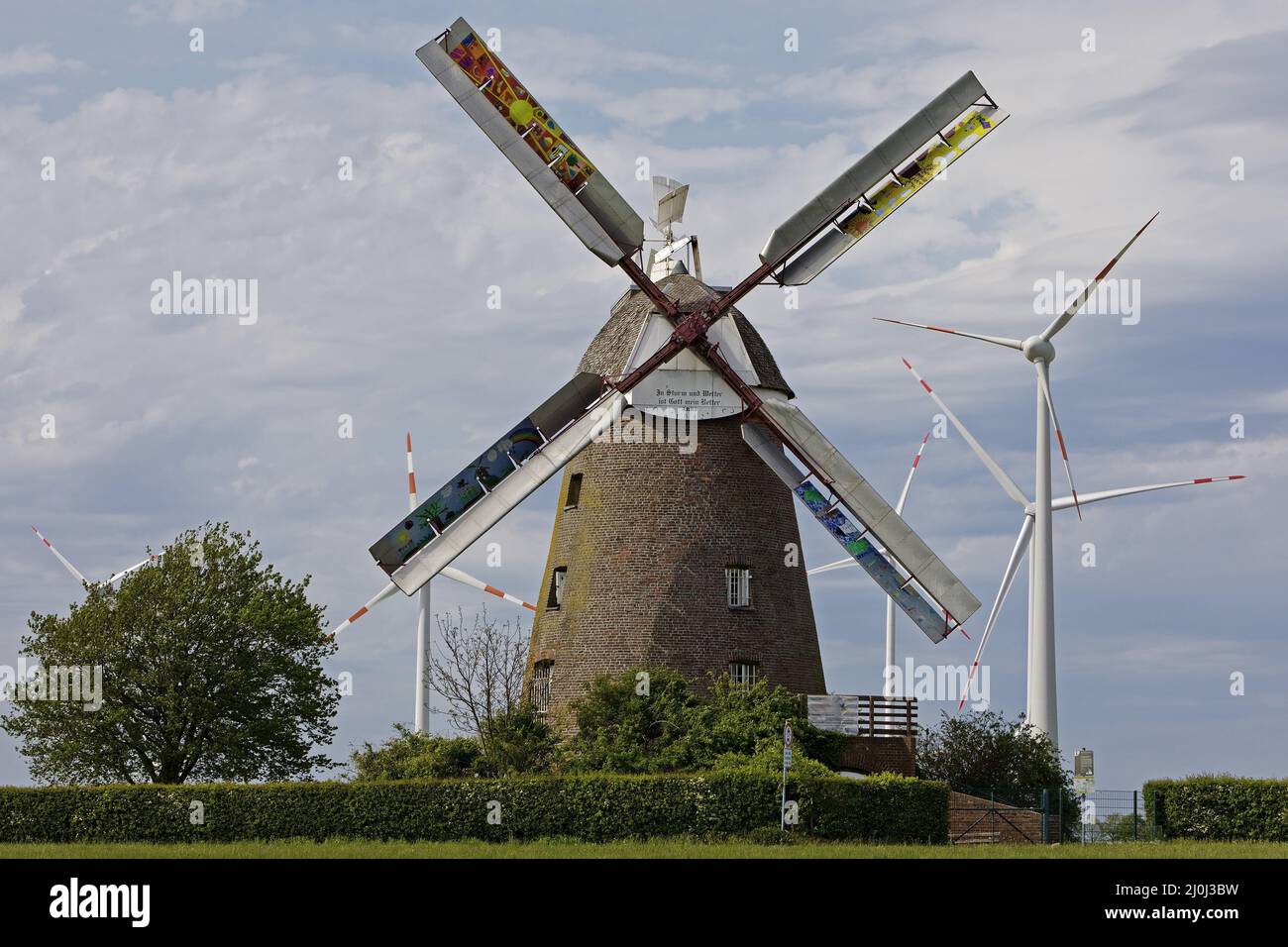 Museum windmill with wind turbines, wind energy use yesterday and today ...