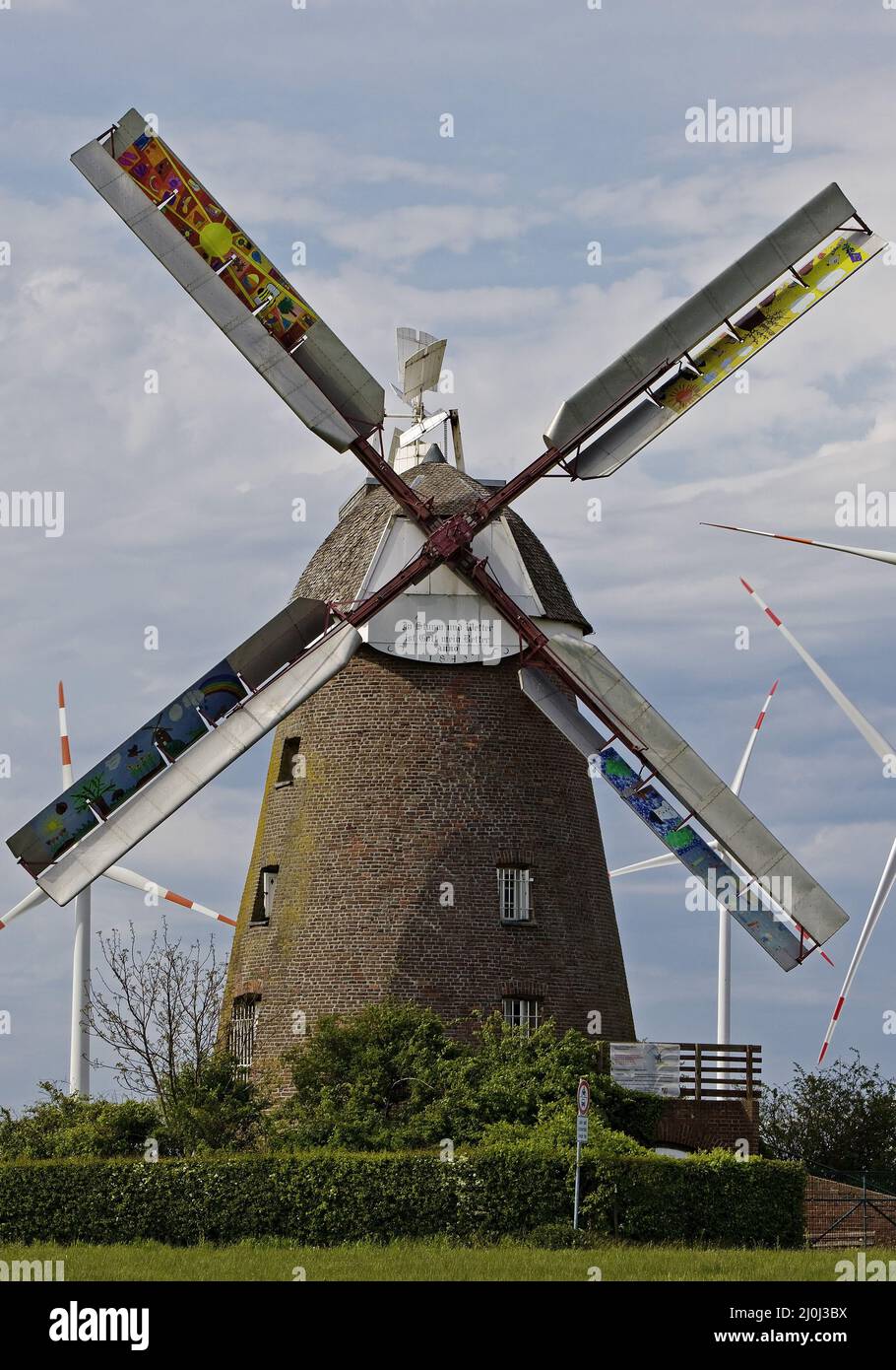 Museum windmill with wind turbines, wind energy use yesterday and today ...