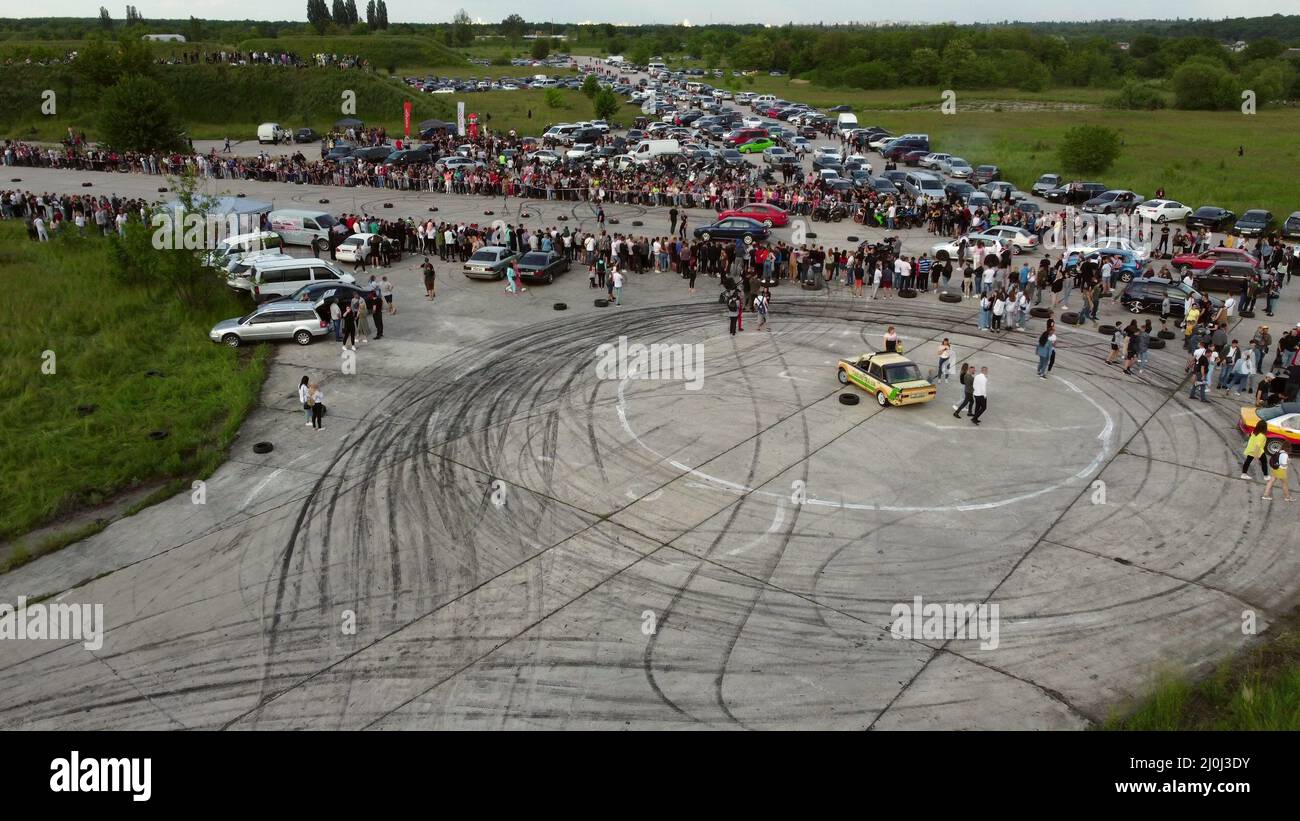 Drag recing. Car competition. Many people cars. Top view Stock Photo ...