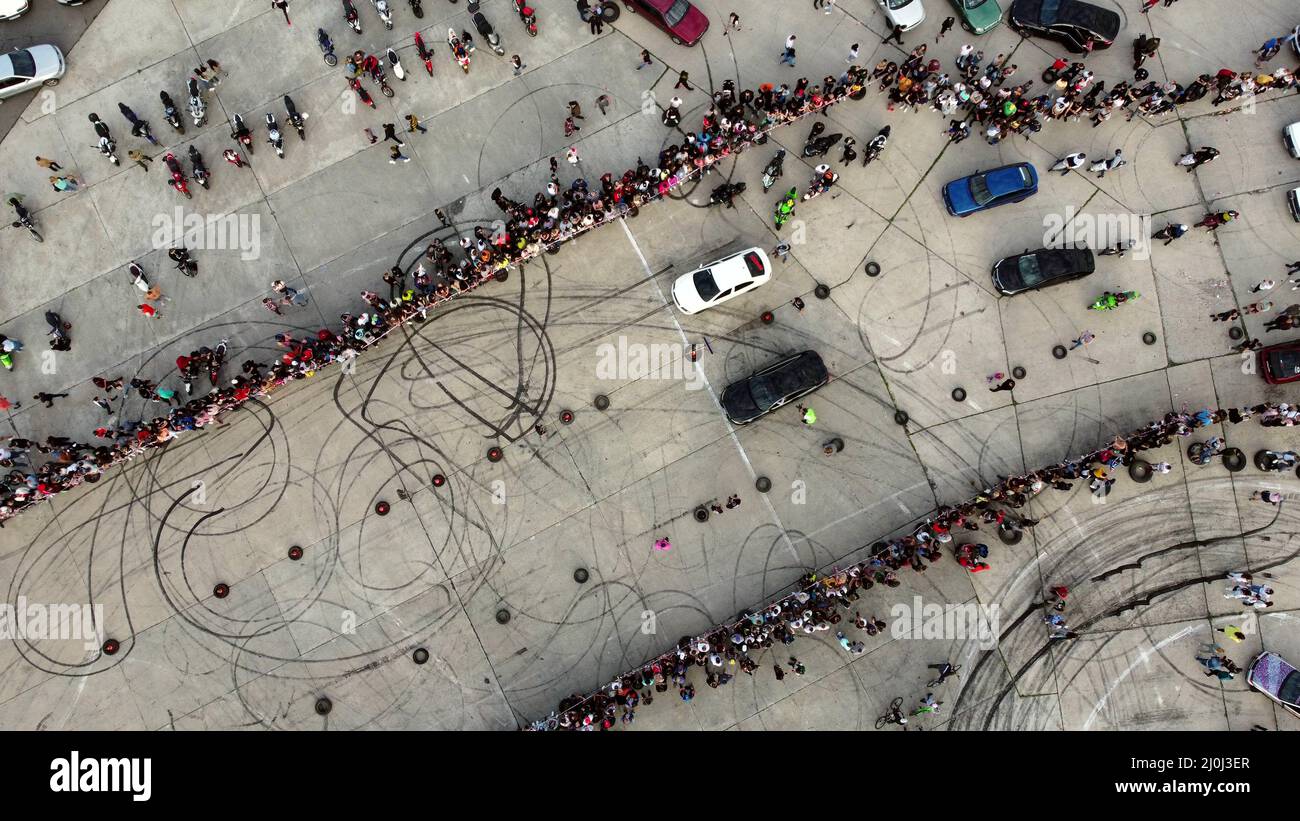 Drag recing. Car competition. Many people cars. Top view Stock Photo ...