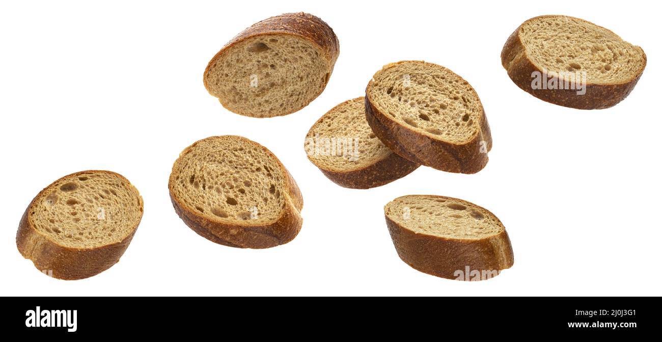 Falling slices of rye bread isolated on white background Stock Photo ...