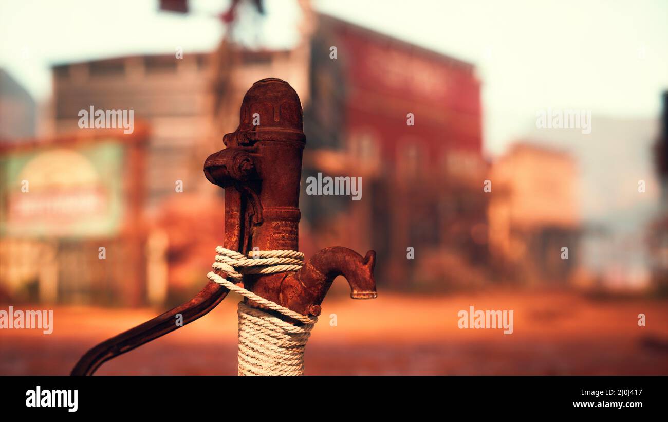 Old rusted water pump in Wild West town Stock Photo - Alamy