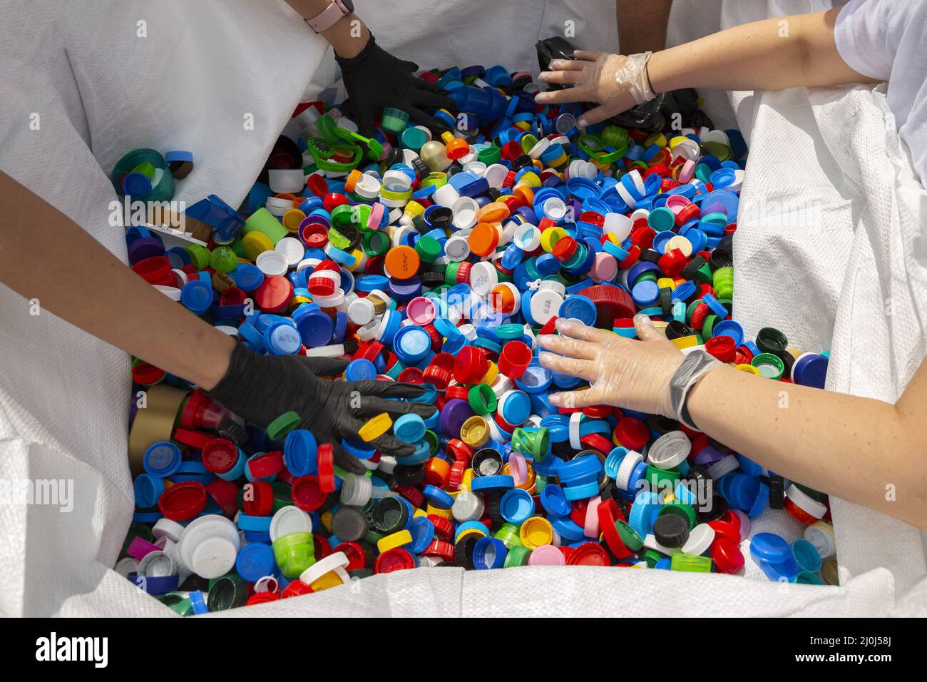 Workers sort garbage waste recycling hi-res stock photography and ...