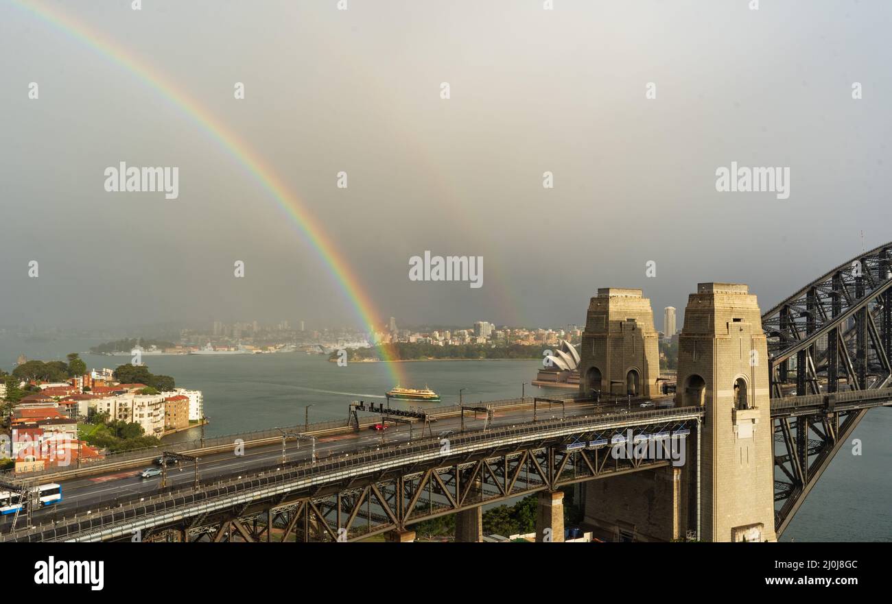 View of the rainbow on Sydney Ferry behind the Sydney Harbour Bridge ...