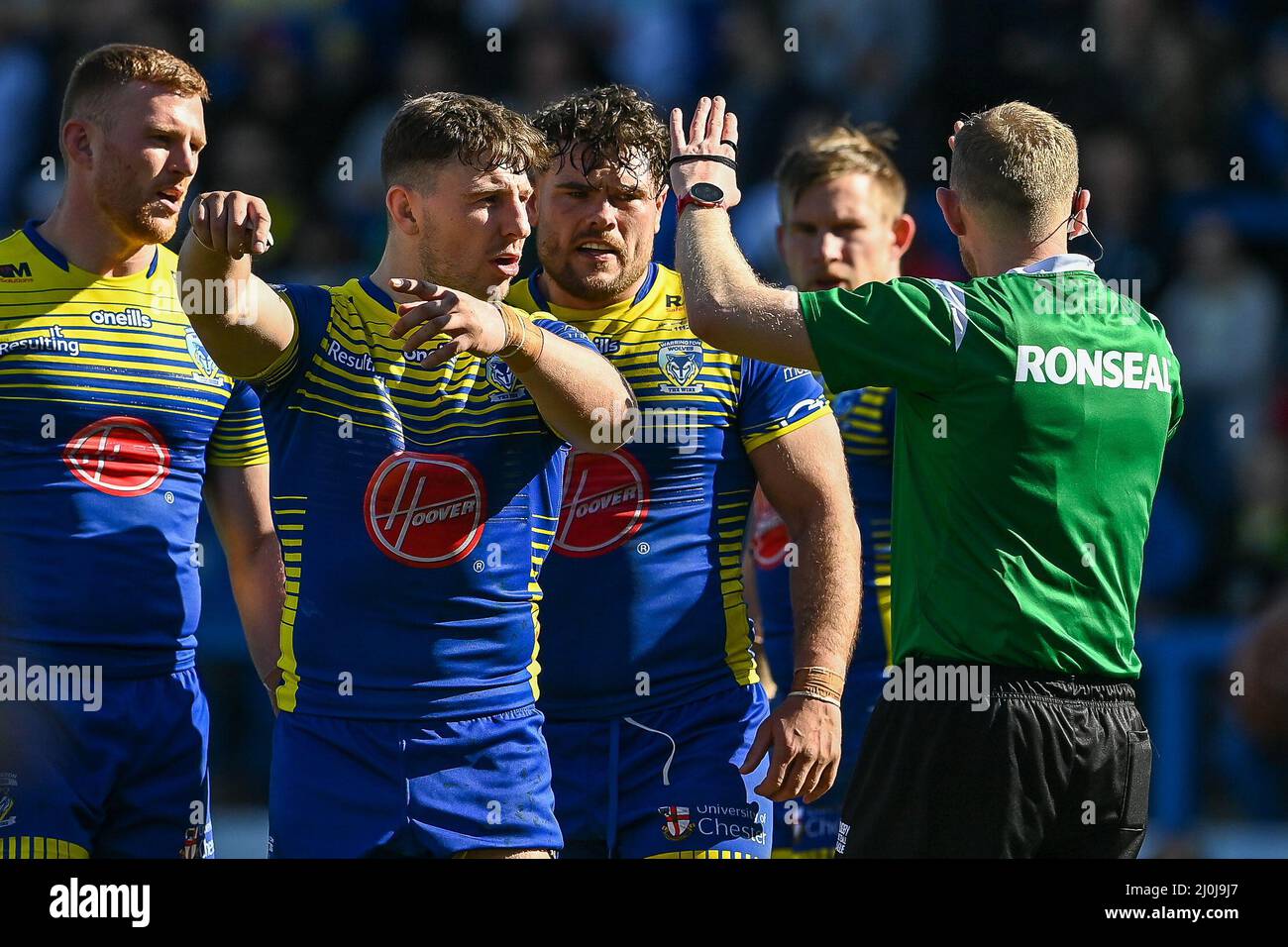 George Williams #7 of Warrington Wolves speaks to referee Robert Hicks ...