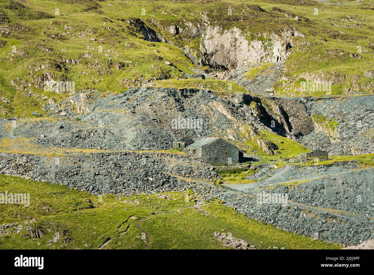 Dubs hut mountain bothy hidden in amongst the slate covered quarry ...
