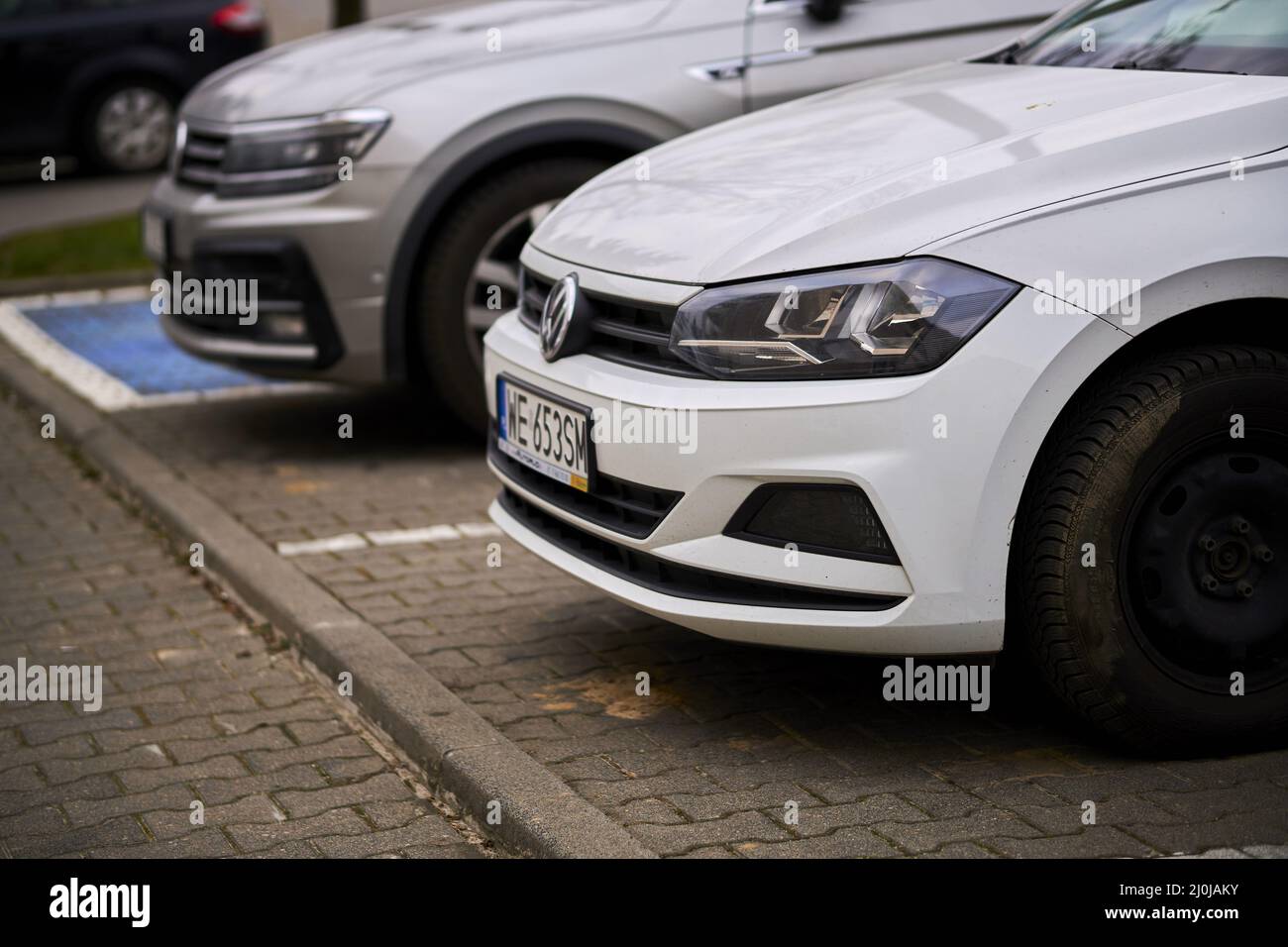 A view of parked cars on a street in the city center Stock Photo - Alamy