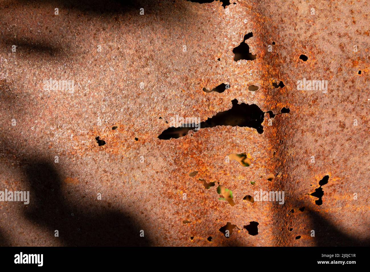 Rust on a metal part of industrial equipment obtained due to corrosion ...