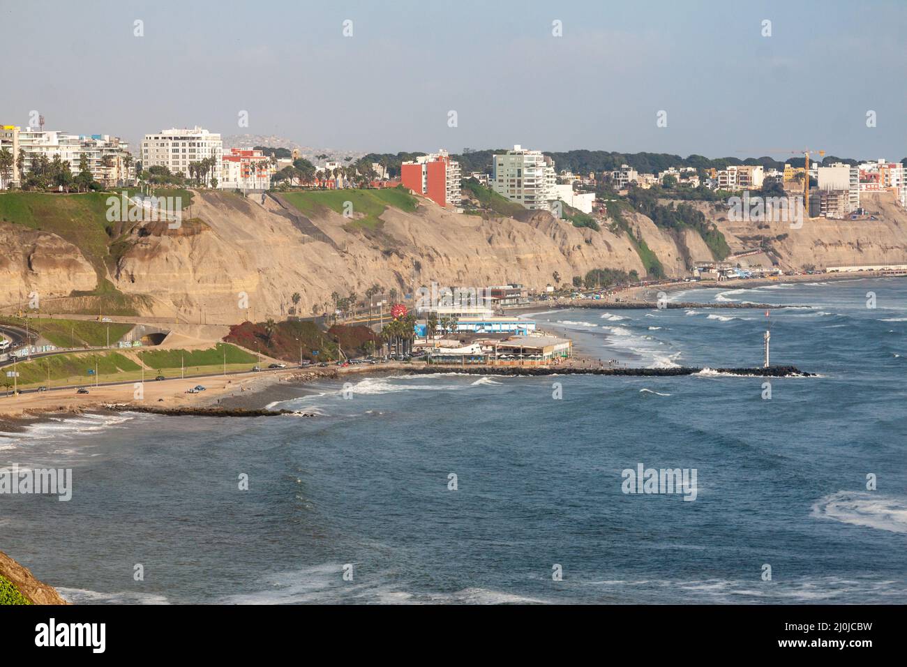 Aerial view of cliffs alongside the Miraflores beach in Lima, Peru ...