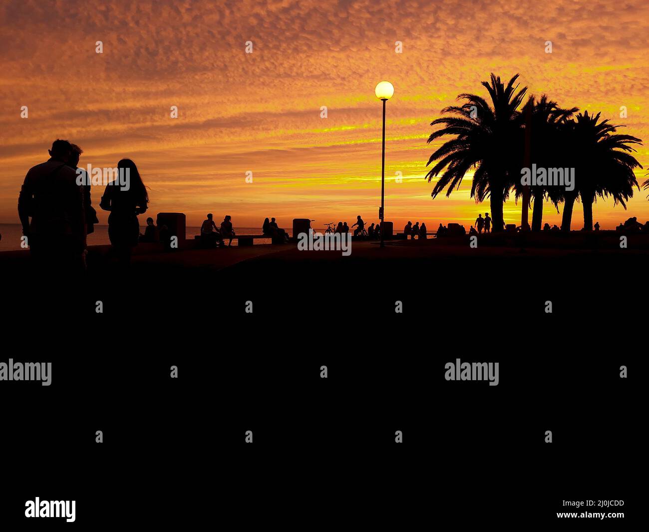 Boardwalk Sunset Silhouette Scene Stock Photo - Alamy