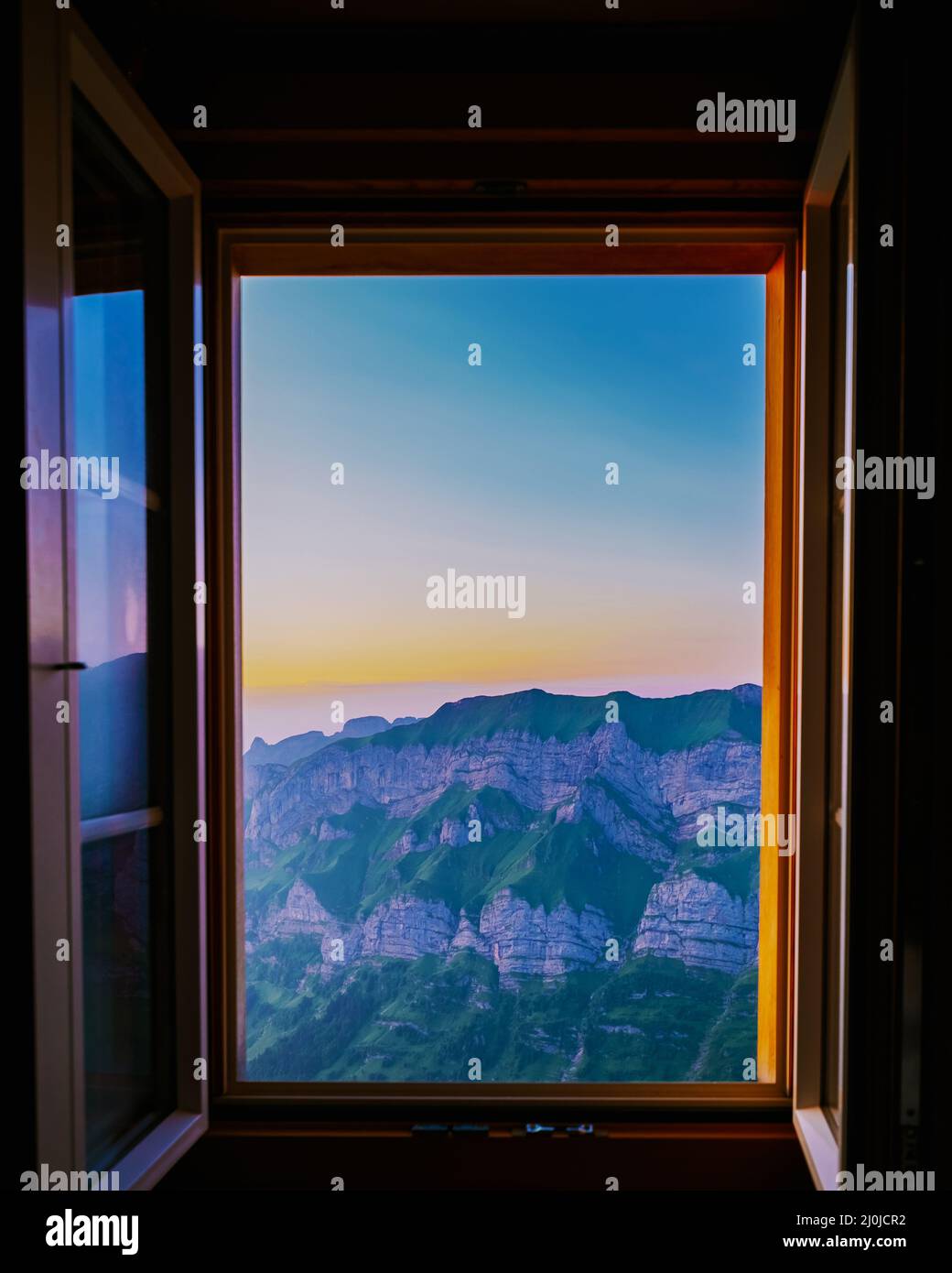 View trough the window at Schaefler Altenalptuerme mountain ridge swiss ...