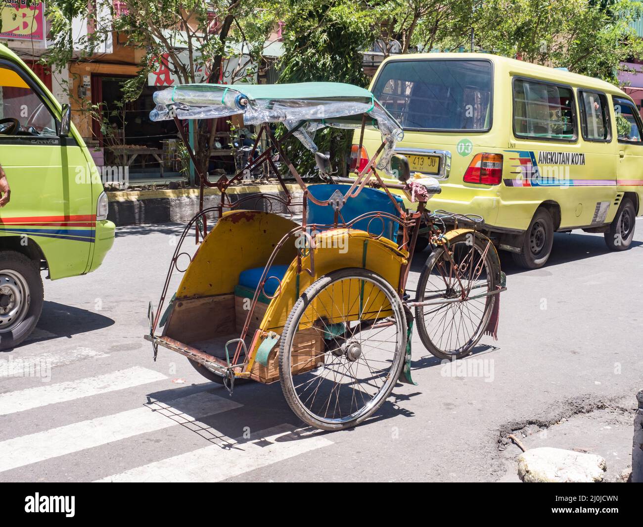 Ambon, Indonesia - Feb, 2018: Becaks, the traditional transportation in ...