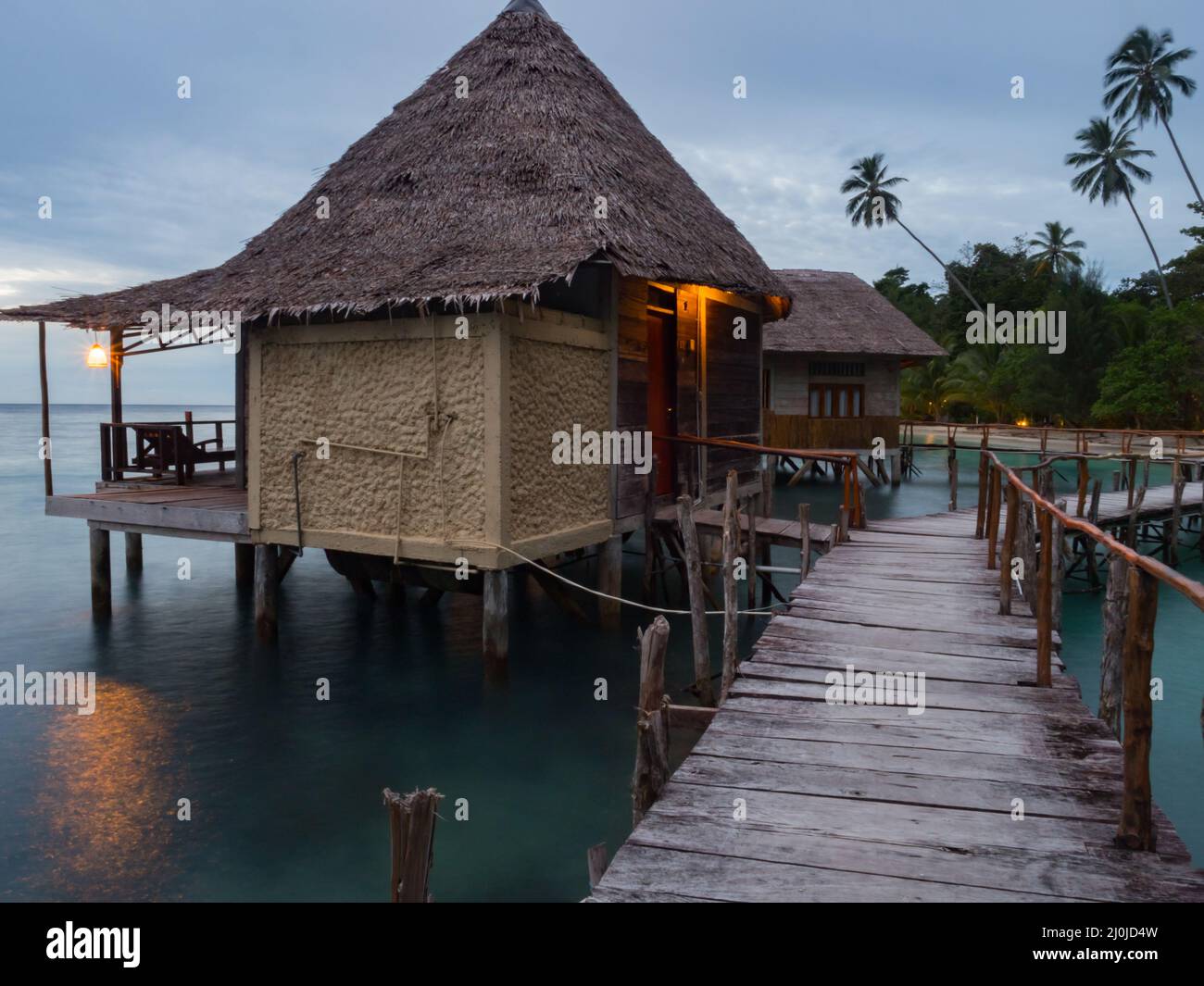 Ora Beach, Indonesia - February 14, 2018: Houses on the water in Ora ...