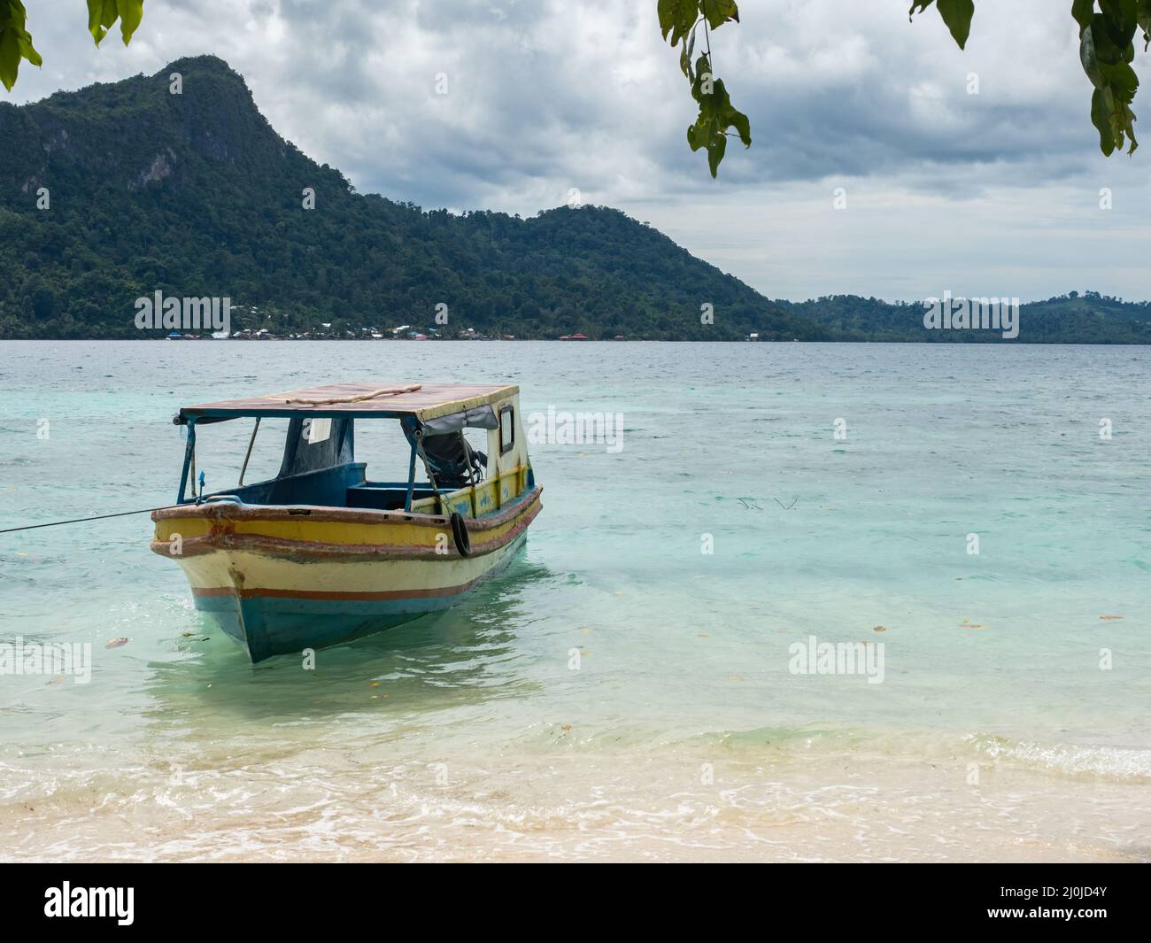 Ora Beach, Indonesia - Feb, 2018: Boat on the tropical beach of Ora ...