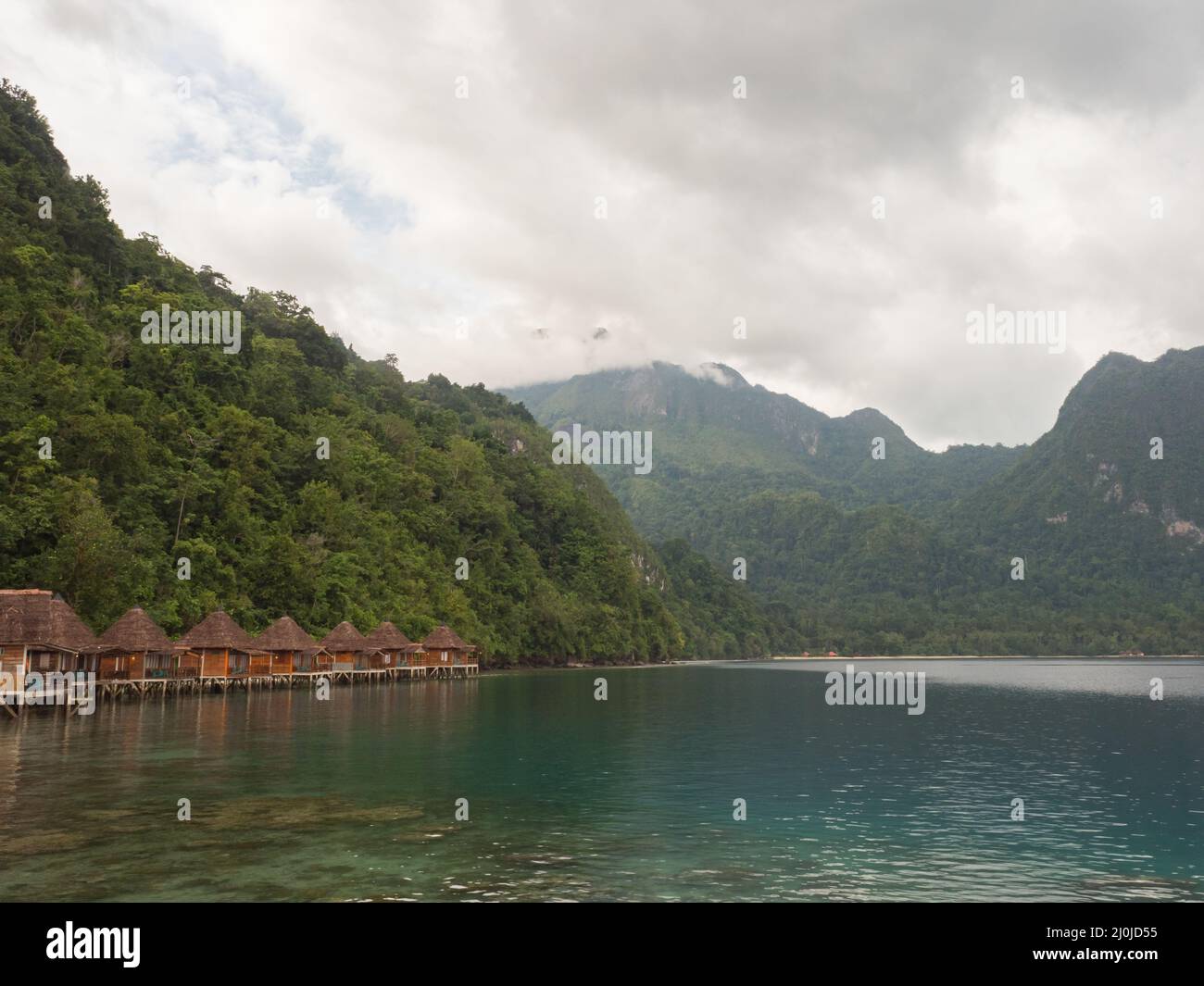 Ora Beach, Indonesia - February 14, 2018: Houses on the water in Ora ...