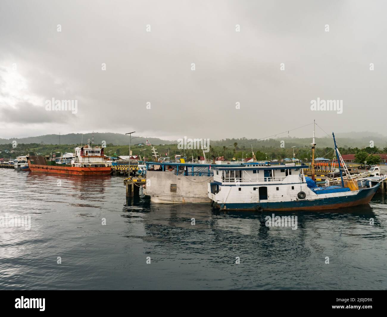 Ambon Island, Indonesia - Feb 2018: Fishing boat floating between the ...