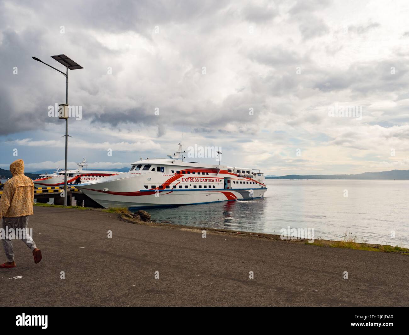 Ambon, Indonesia - February 15, 2018: A boat floating between the ...