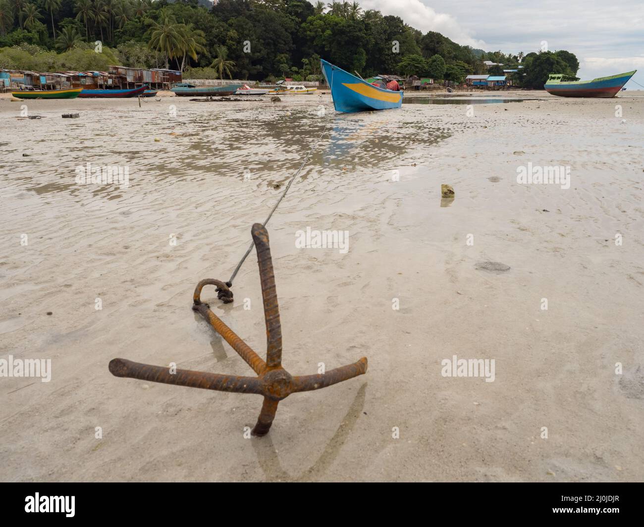 Kaimana, Arguni Bay, Indonesia - February 2018: Colorful wooden boats ...