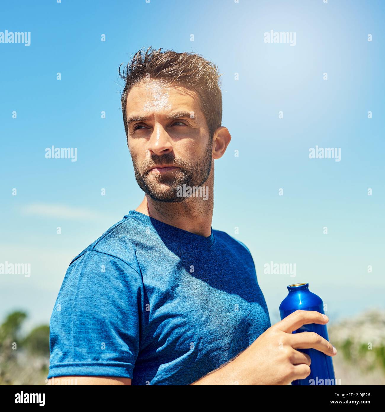 Refuelling before setting off towards his fitness goals again. Cropped ...
