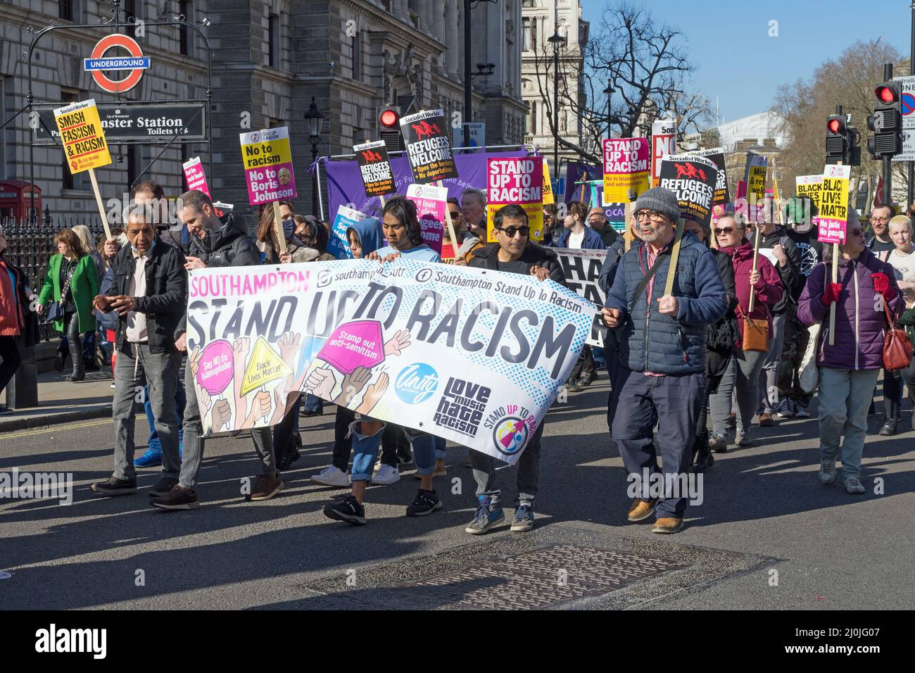 Anti Racism protest on the streets of London. A group of people holding ...