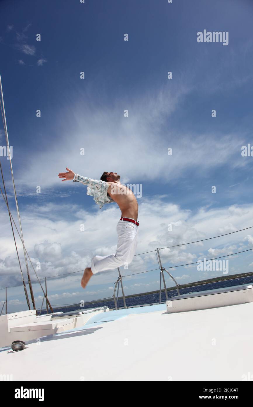 Man sailing boat hi-res stock photography and images - Alamy