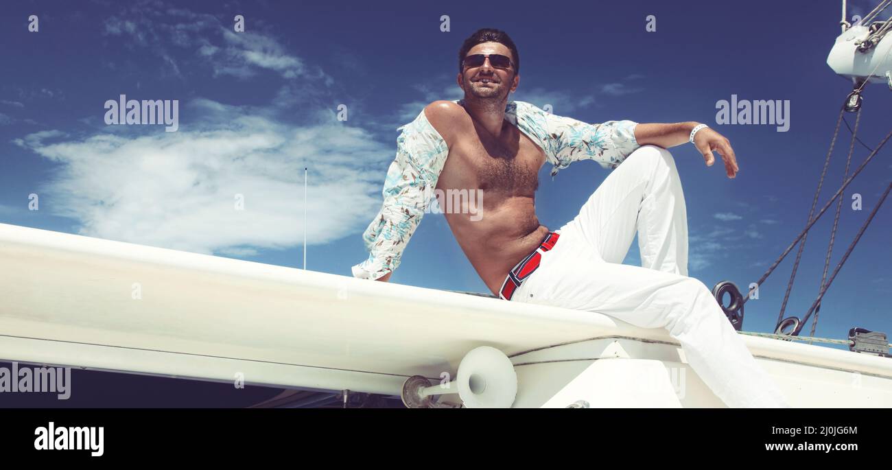 Man sailing boat hi-res stock photography and images - Alamy