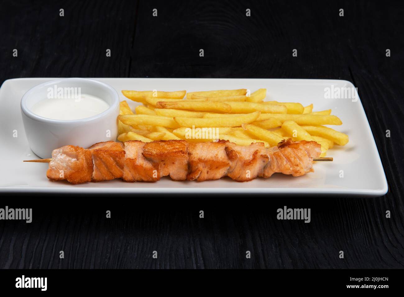 Grilled salmon fish shashlik Stock Photo - Alamy