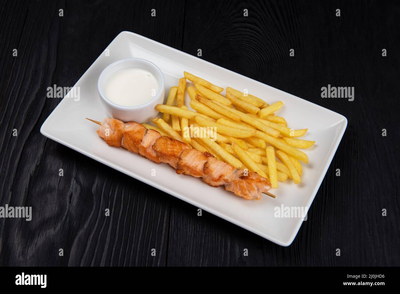 Grilled salmon fish shashlik Stock Photo - Alamy