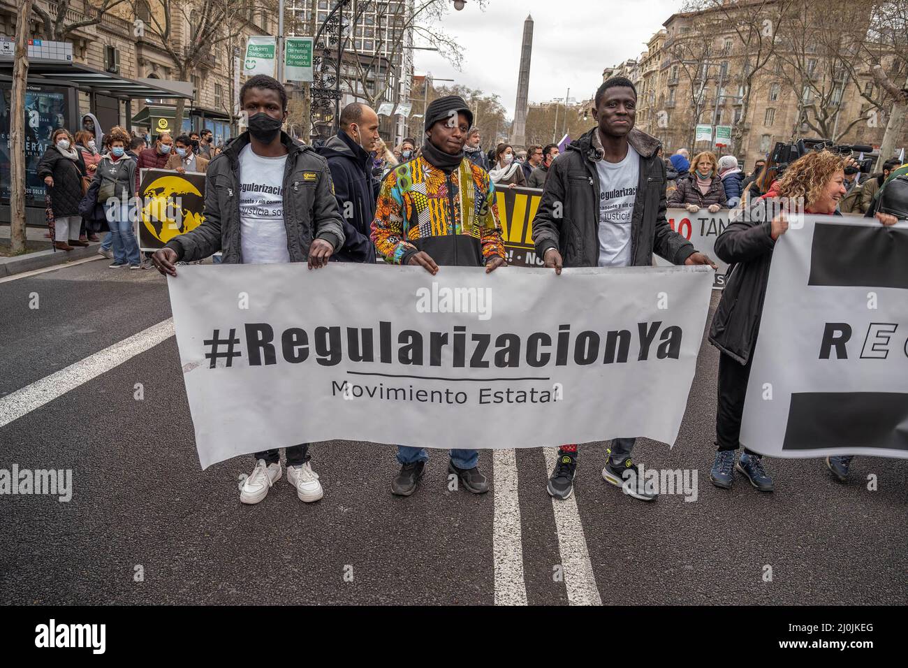 Barcelona, Spain. 19th Mar, 2022. Protesters hold a banner calling for ...