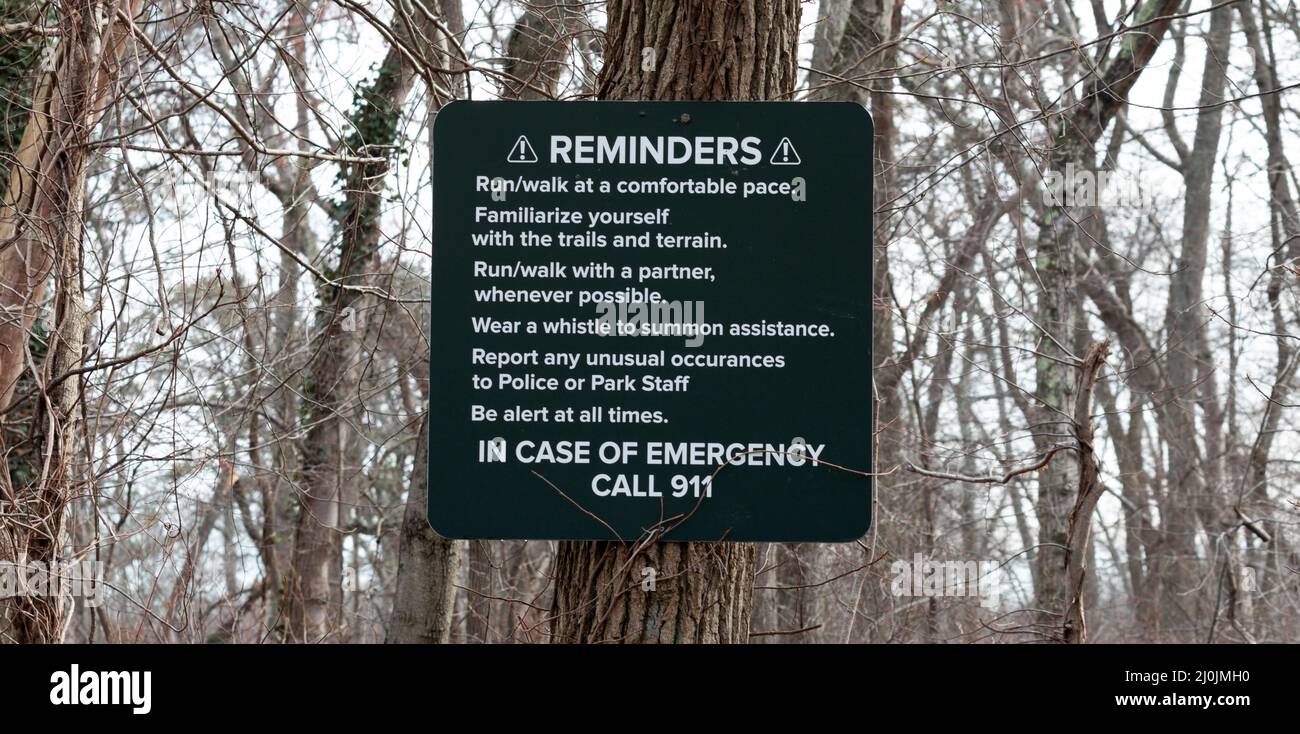 A warning sign reminding people to be aware of the surroundings posted ...