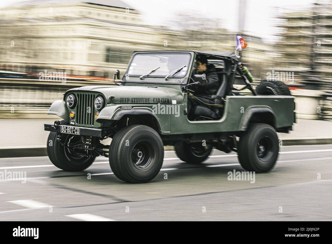 Old classic green off road car in the city, Jeep CJ8 Stock Photo - Alamy