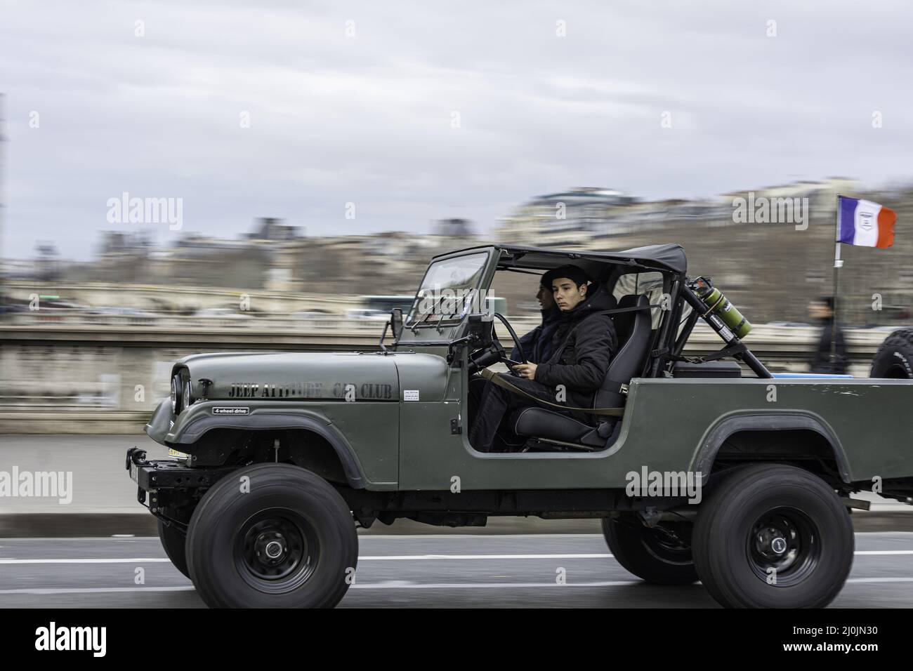 An old classic green off road car in the city, Jeep CJ8 Stock Photo - Alamy