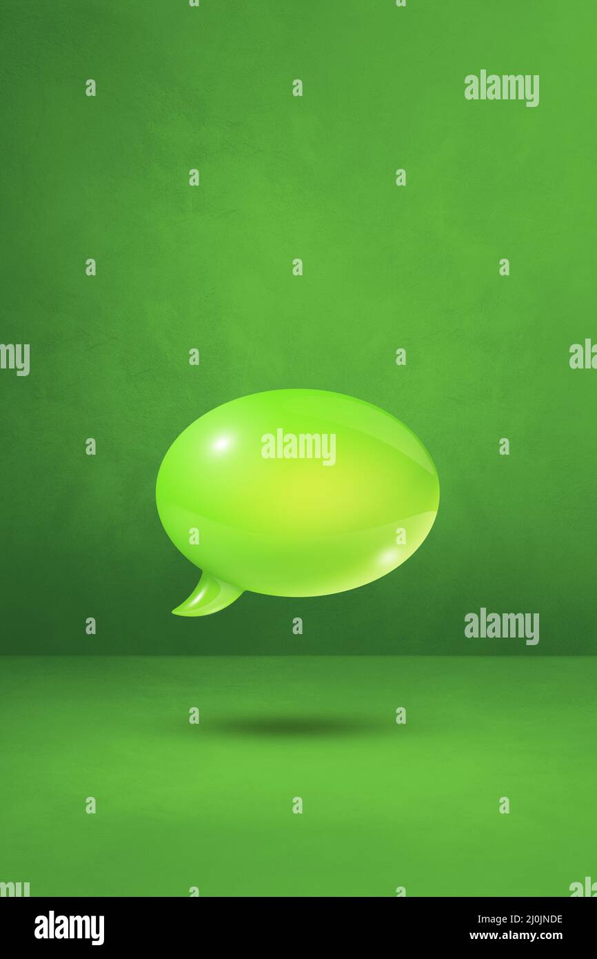 Green speech bubble on concrete wall vertical background Stock Photo ...