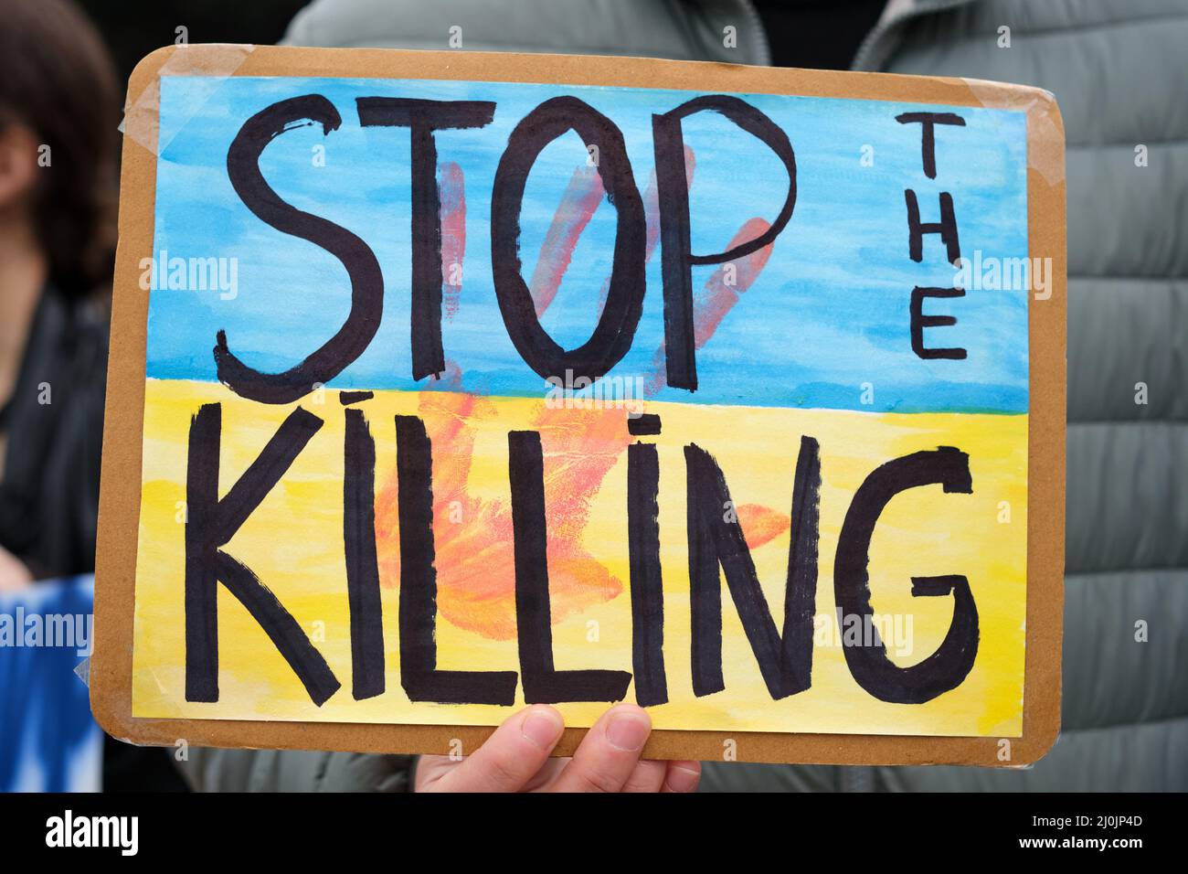 stop the killing sign with Ukranian flag colors Stock Photo - Alamy