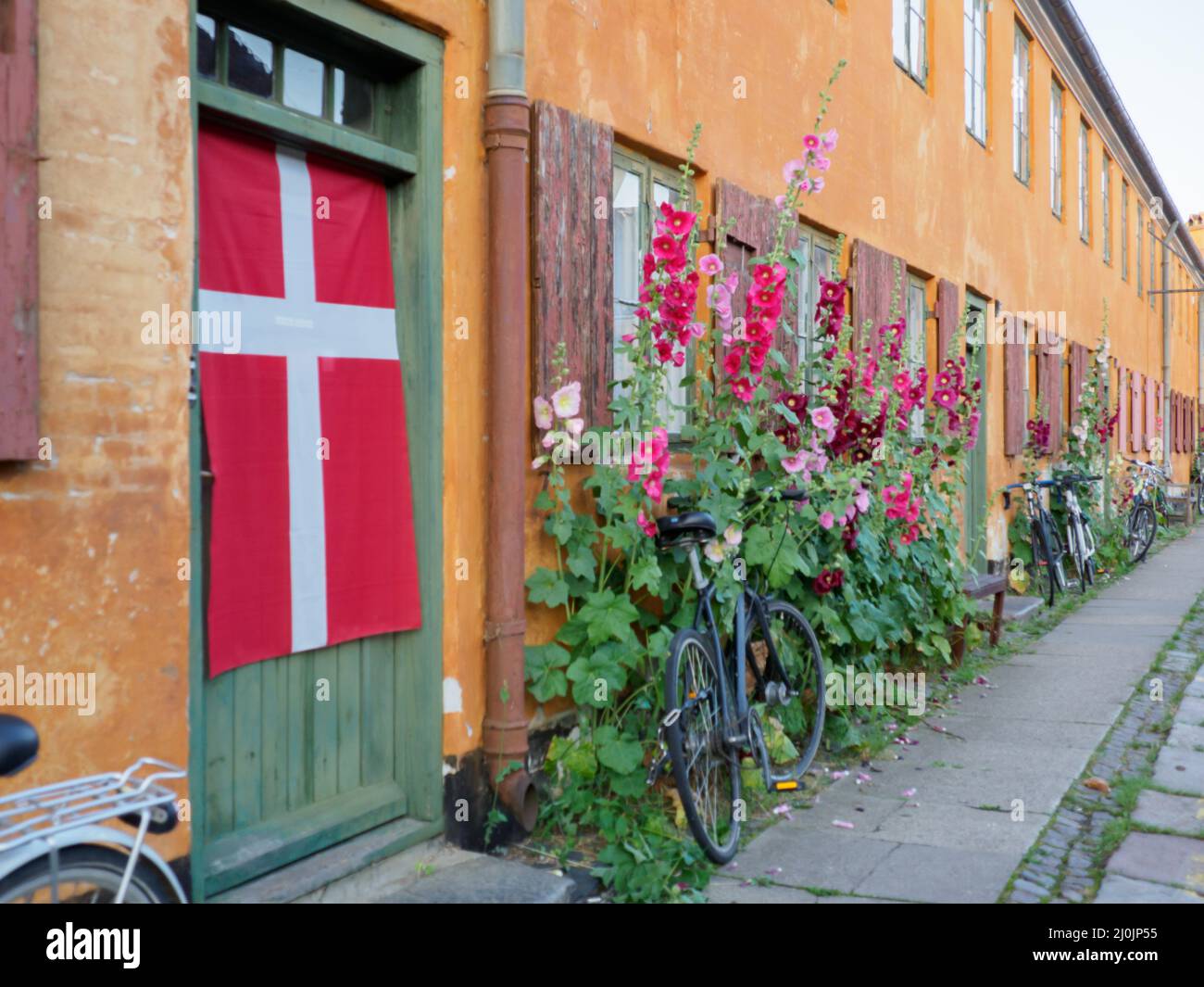 Copenhagen, Denmark - July, 2021: Nyboder is a historic row house ...