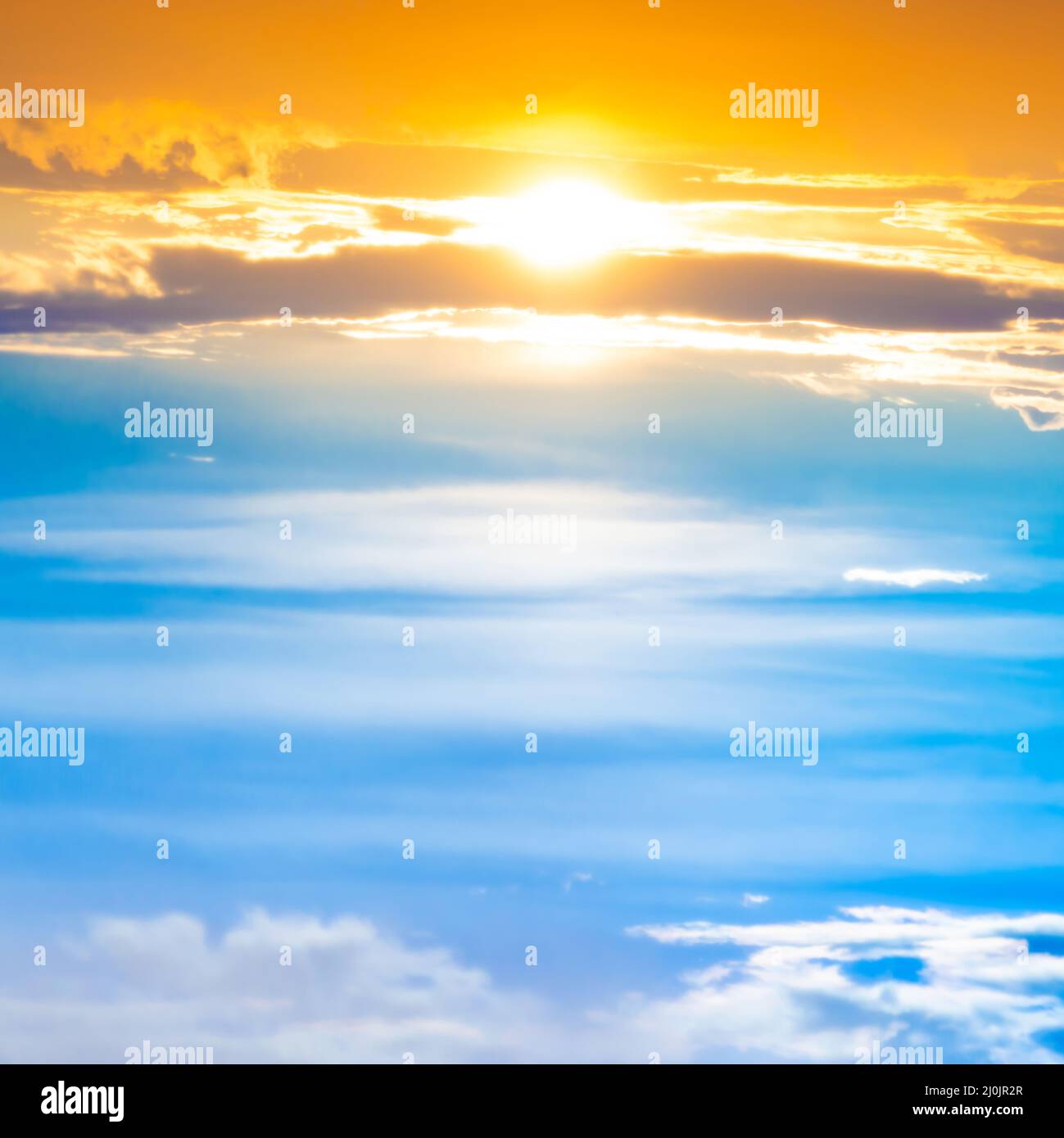 Sunset sky with sun rays Stock Photo - Alamy